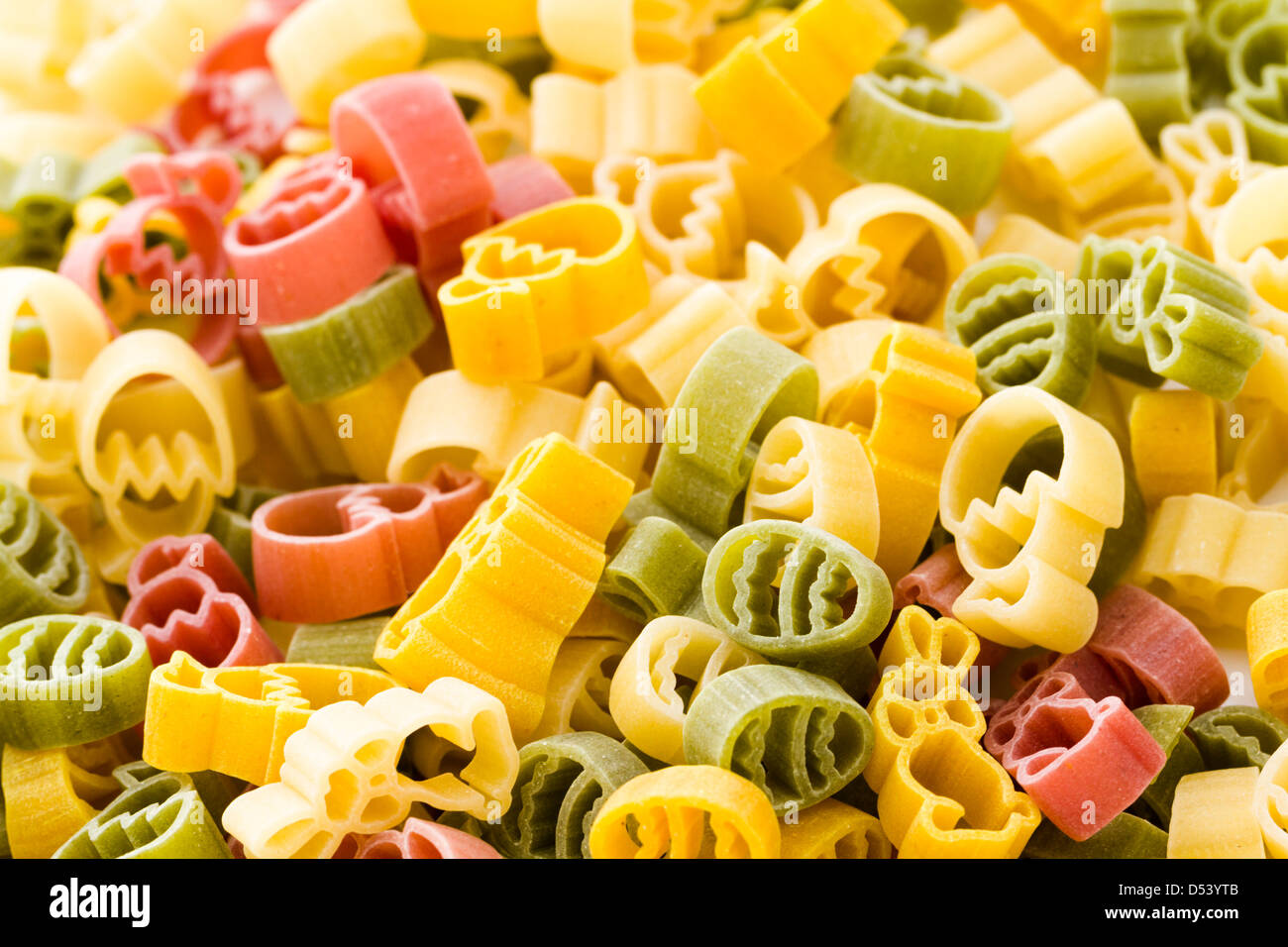 Easter pasta in yellow, red and green colors Stock Photo - Alamy