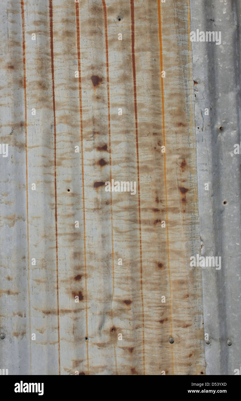 A rusty corrugated iron metal fence close up/ Zinc wall Stock Photo - Alamy