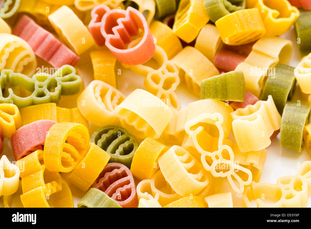 Easter pasta in yellow, red and green colors Stock Photo - Alamy