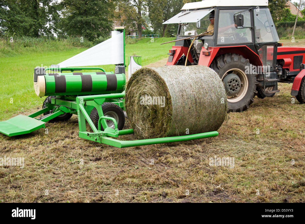 Tractor during work in hi-res stock photography and images - Alamy