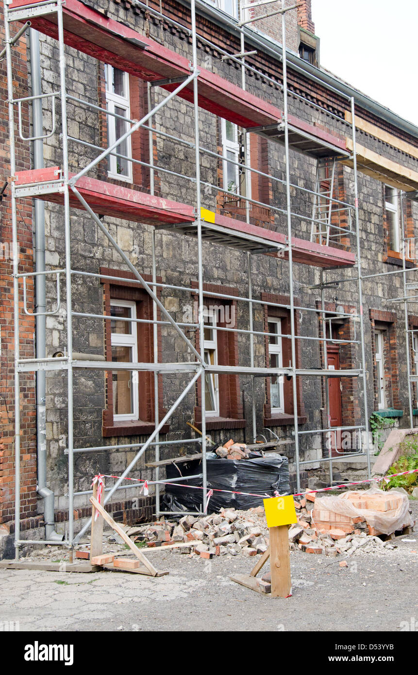 Photo of building with scaffolding during renovation Stock Photo - Alamy