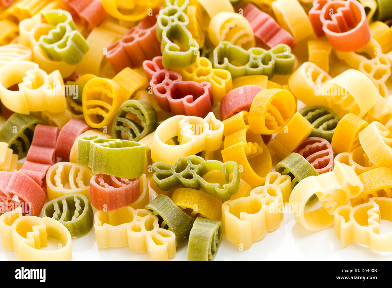 Easter pasta in yellow, red and green colors Stock Photo - Alamy