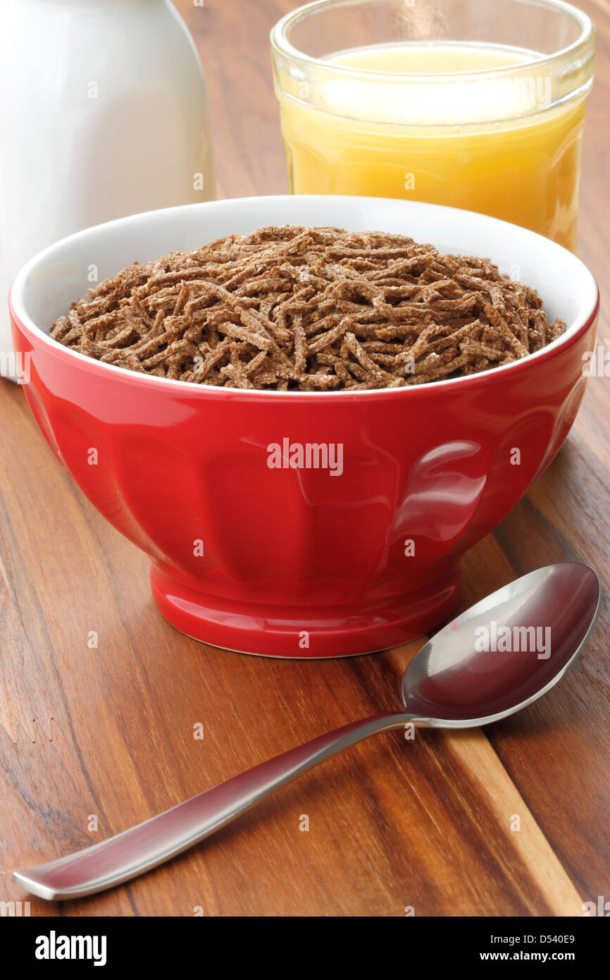 fresh high bran cereal and orange juice Stock Photo - Alamy