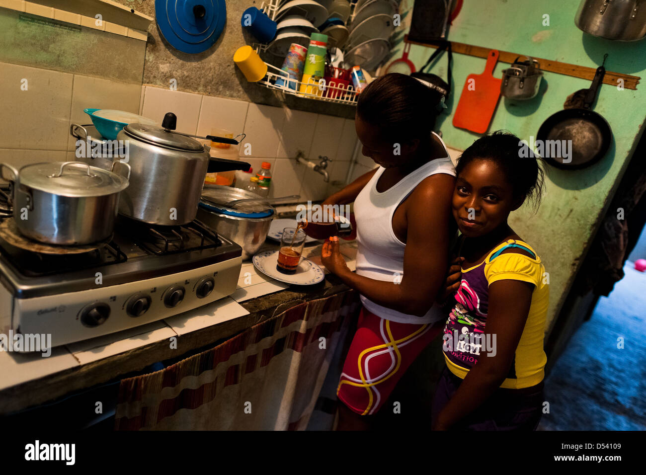 A family of a sugar cane cutter seen in the kitchen of their house in ...