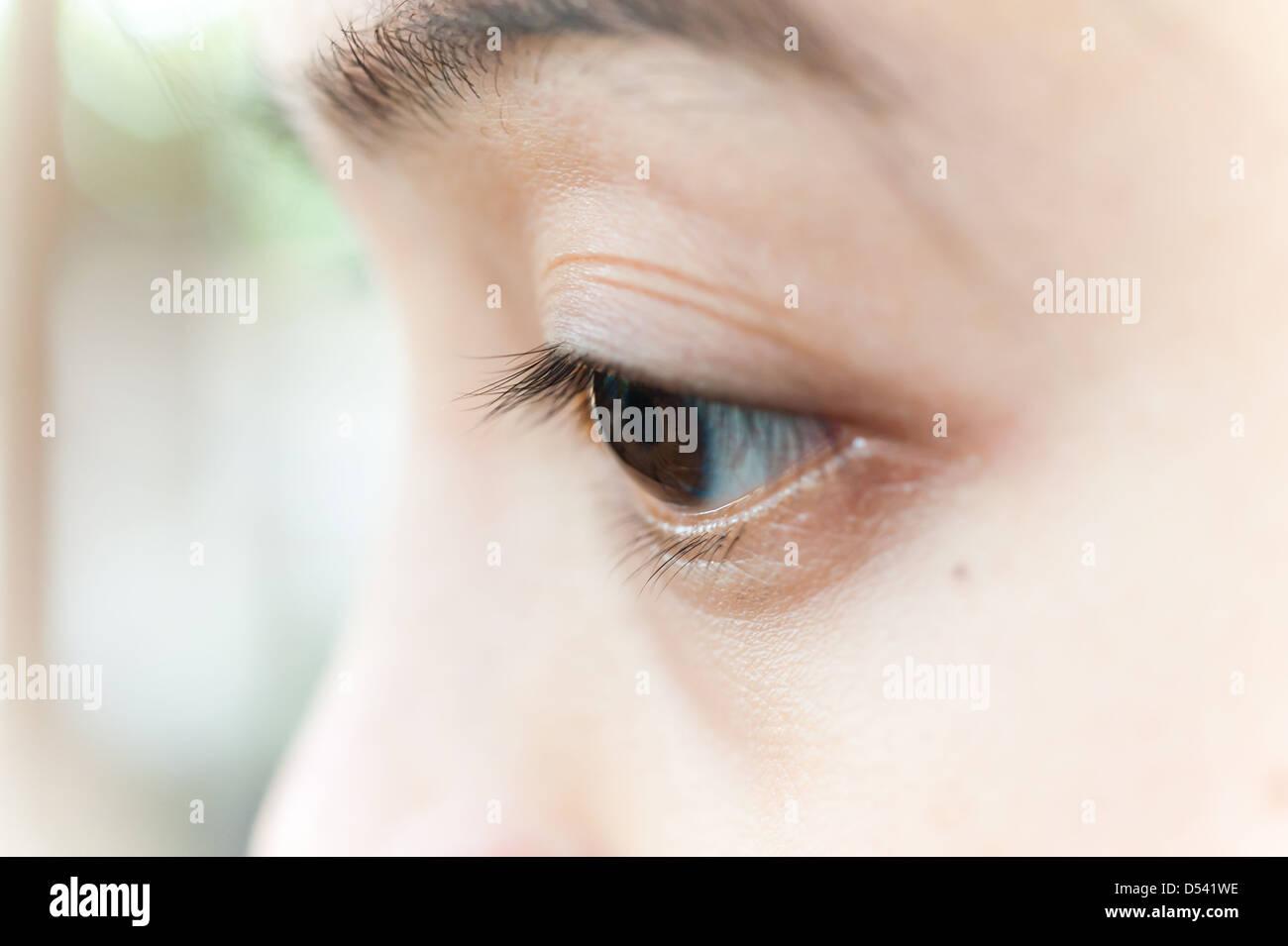asian woman eyes closeup part of face Stock Photo - Alamy