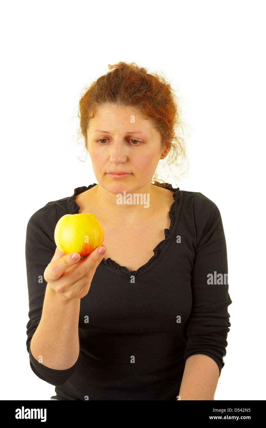 Woman with an apple Stock Photo - Alamy
