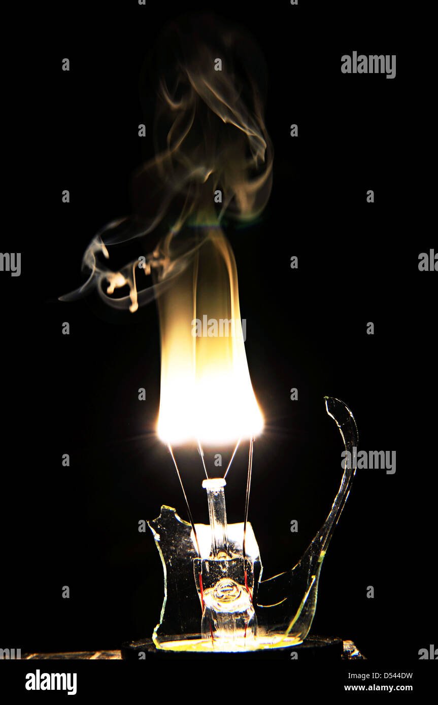 Broken light bulb explosion Stock Photo - Alamy