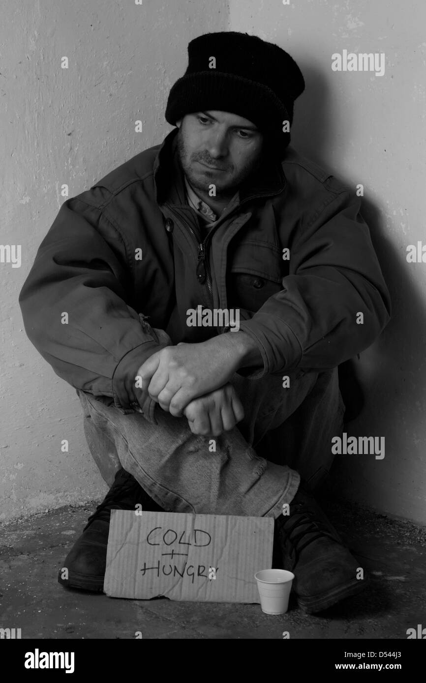 Homeless man begging for money Stock Photo - Alamy