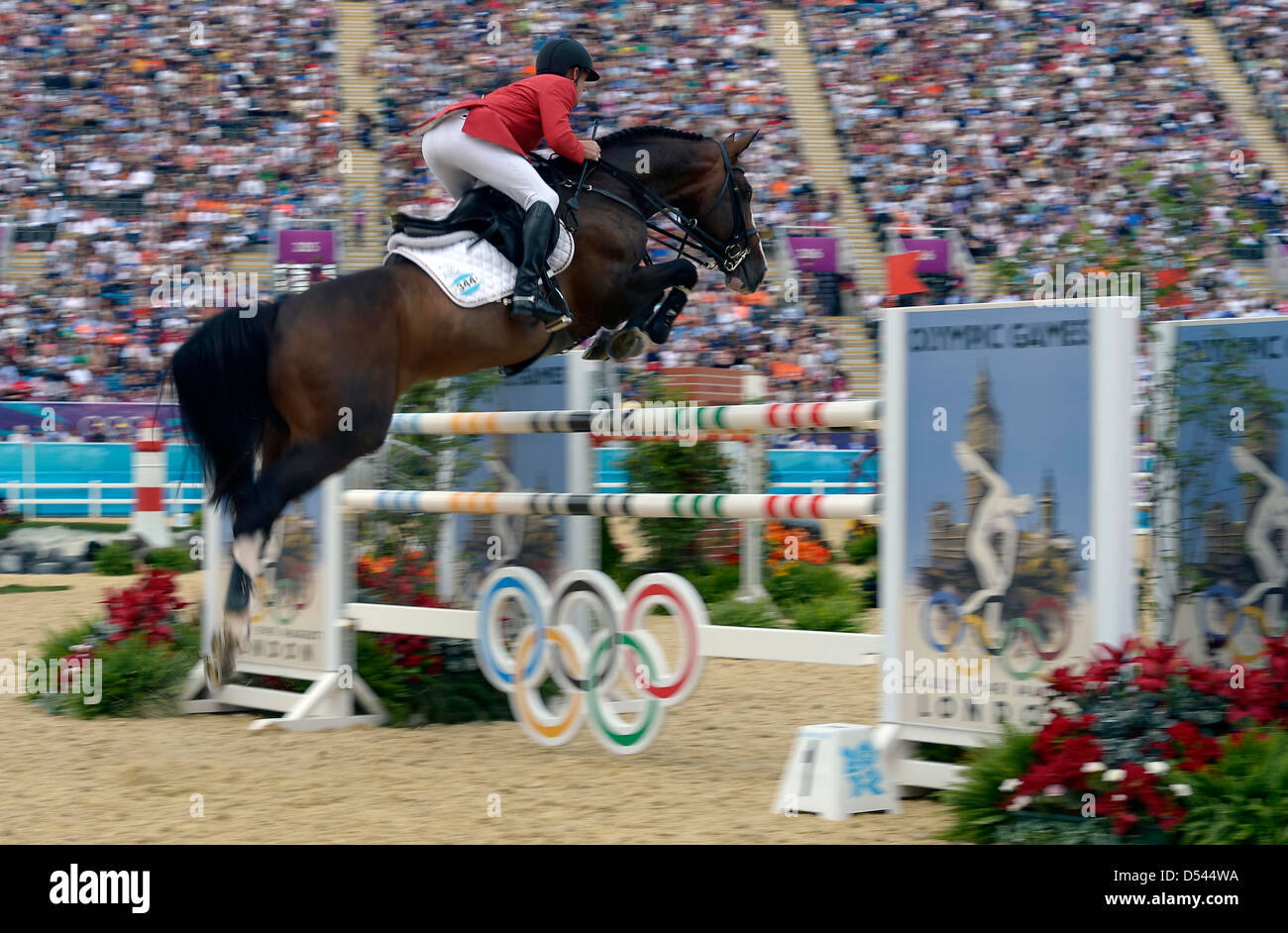 Marcus Ehning riding Plot Blue (GER, Germany). Team Showjumping Stock ...