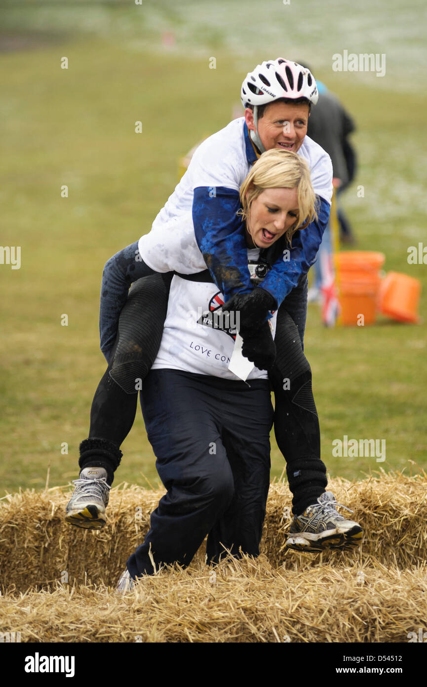 UK Wife Carrying Race, The Nower, Dorking, UK. 24th March, 2013. One ...