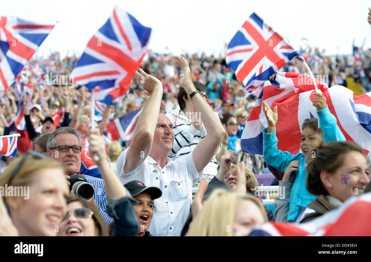 The Union flags wave in the crowd. Team Showjumping Stock Photo - Alamy