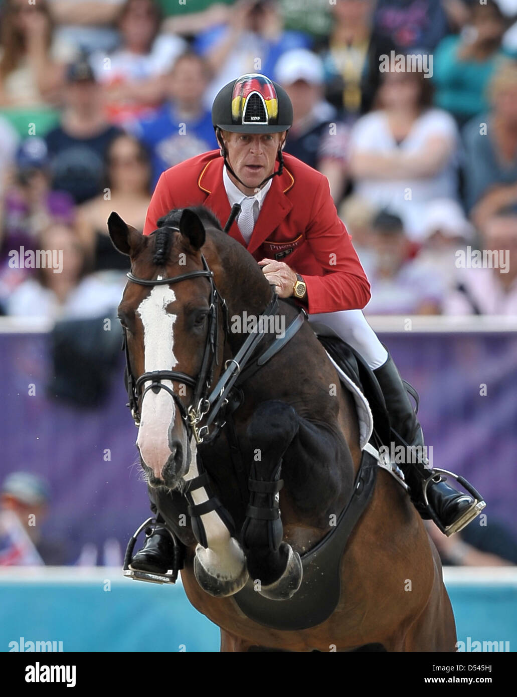Marcus Ehning riding Plot Blue (GER, Germany). Team Showjumping Stock ...