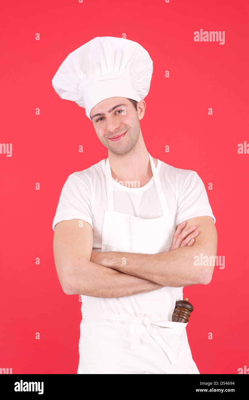 chef shot in red background Stock Photo - Alamy