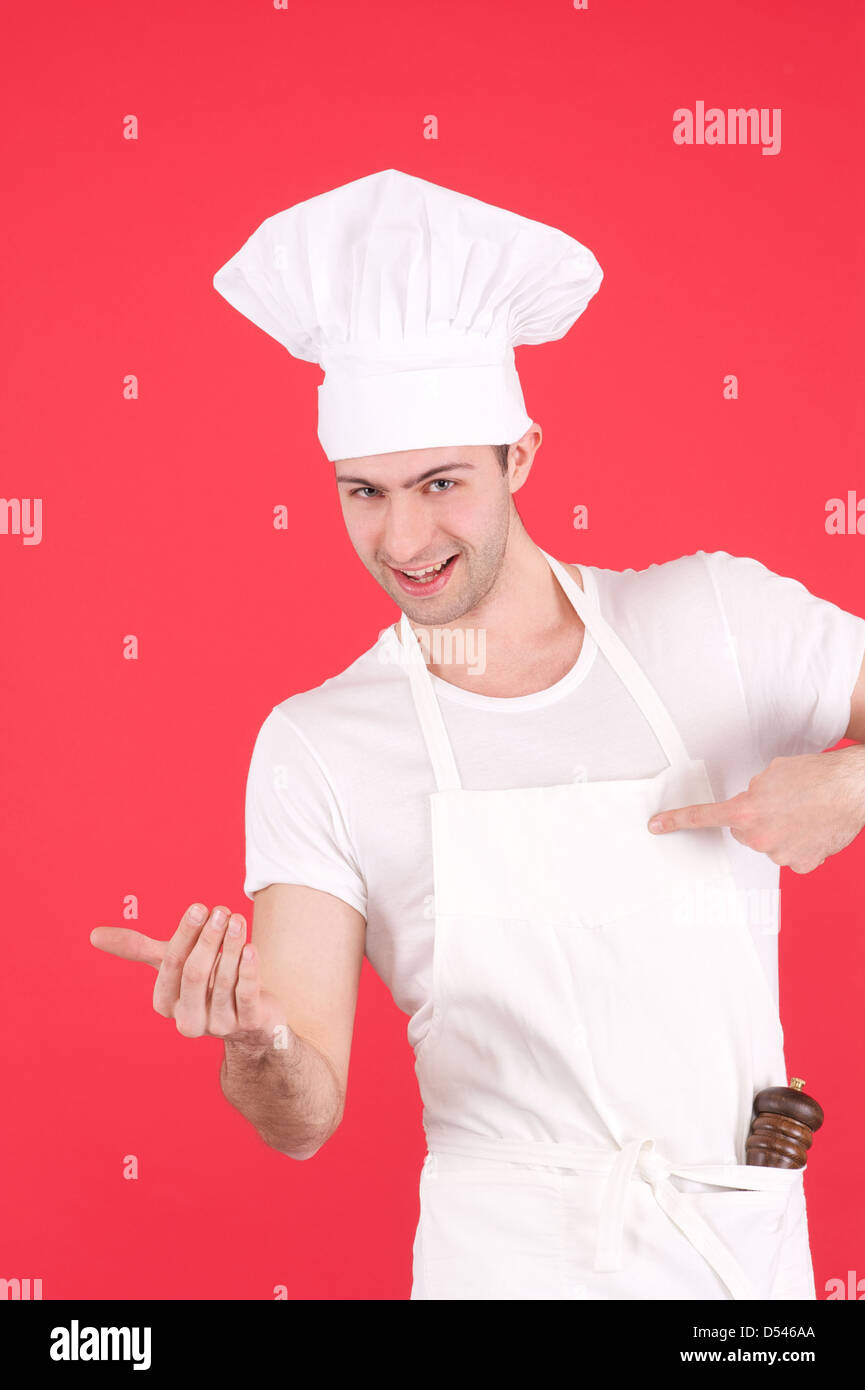 chef shot in red background Stock Photo - Alamy