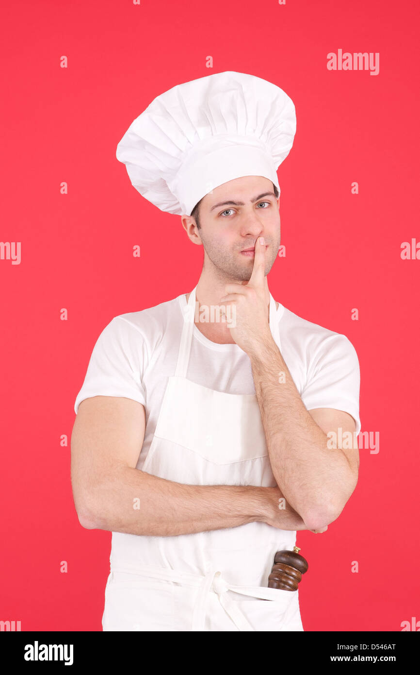 chef shot in red background Stock Photo - Alamy