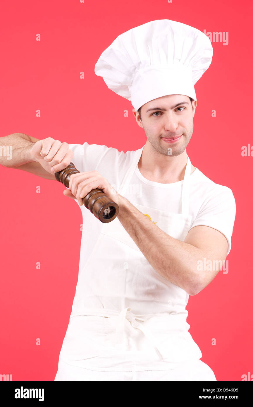 chef shot in red background Stock Photo - Alamy