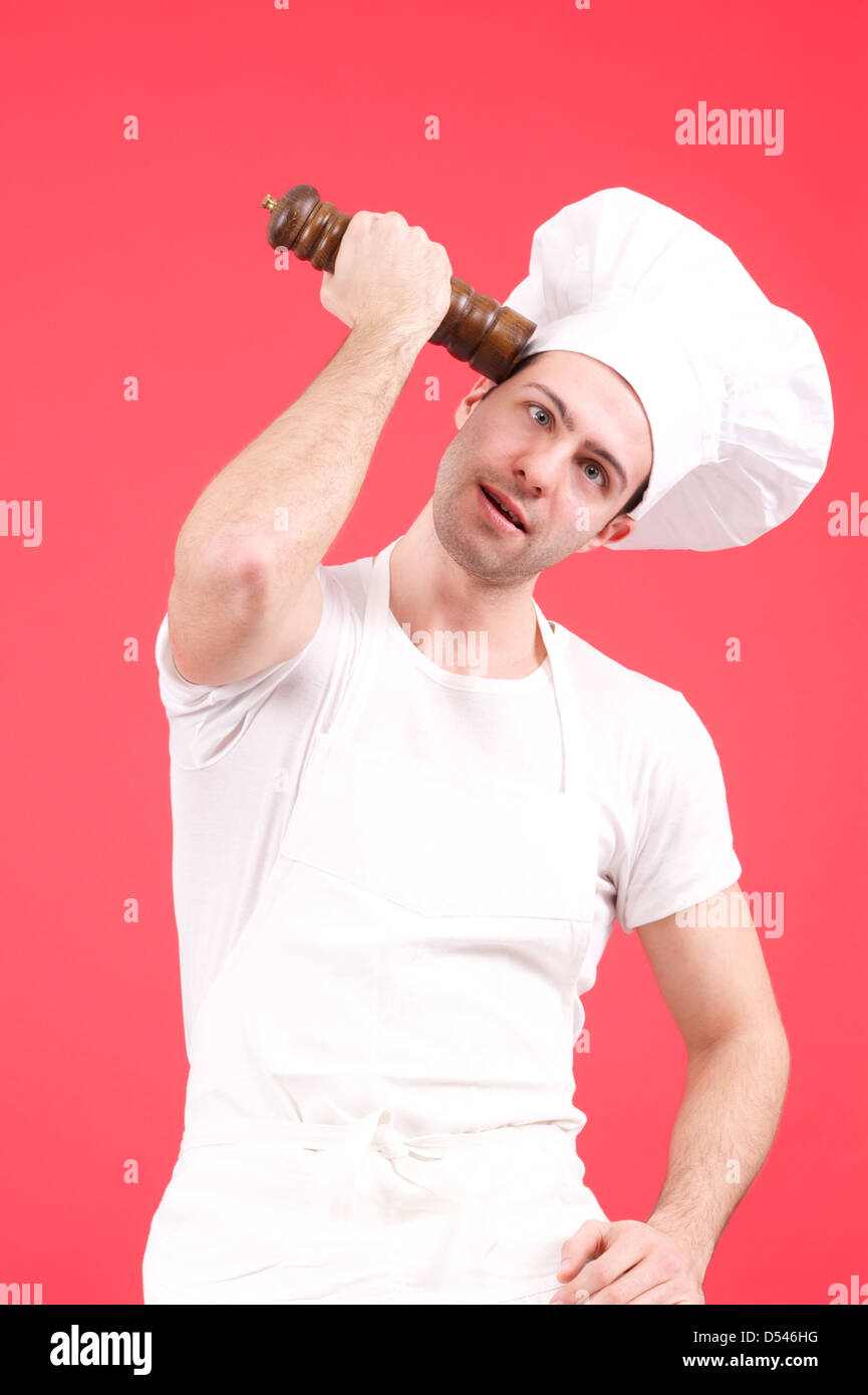 chef shot in red background Stock Photo - Alamy