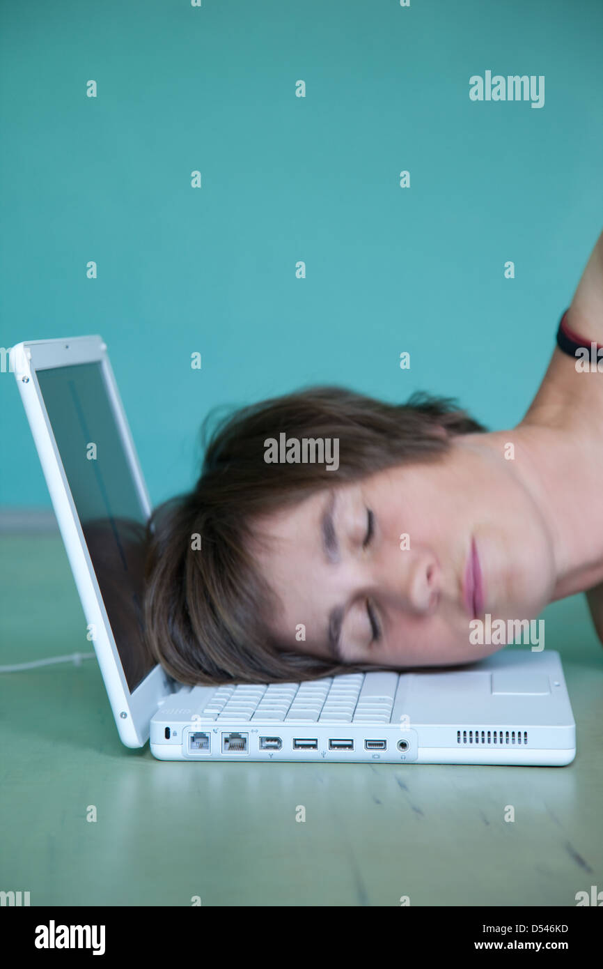 Asleep on a laptop keyboard hi-res stock photography and images - Alamy