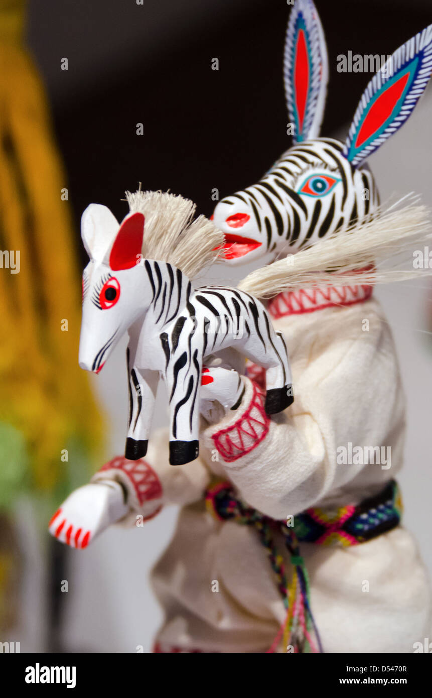 A painted wooden zebra in Laura Anderson Barbata's exhibition ...