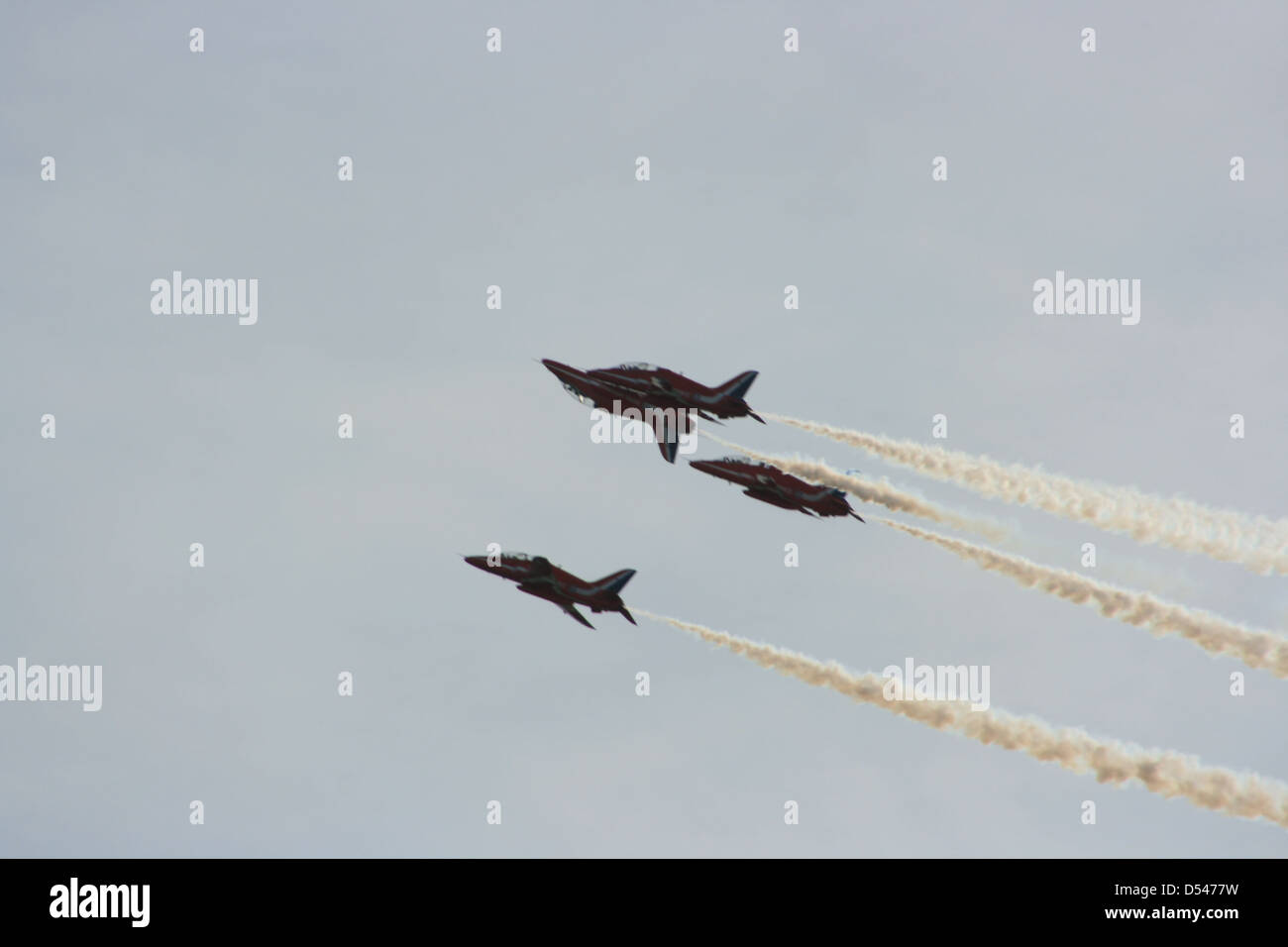 Red Devils taking part in an acrobatic stunt Stock Photo - Alamy