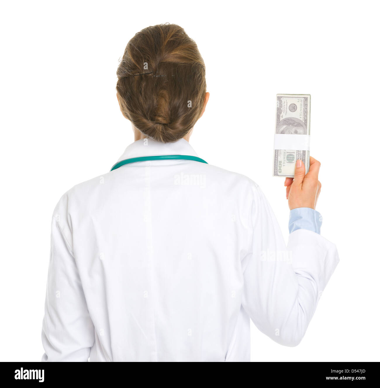 Medical doctor woman holding pack of dollars . rear view Stock Photo ...