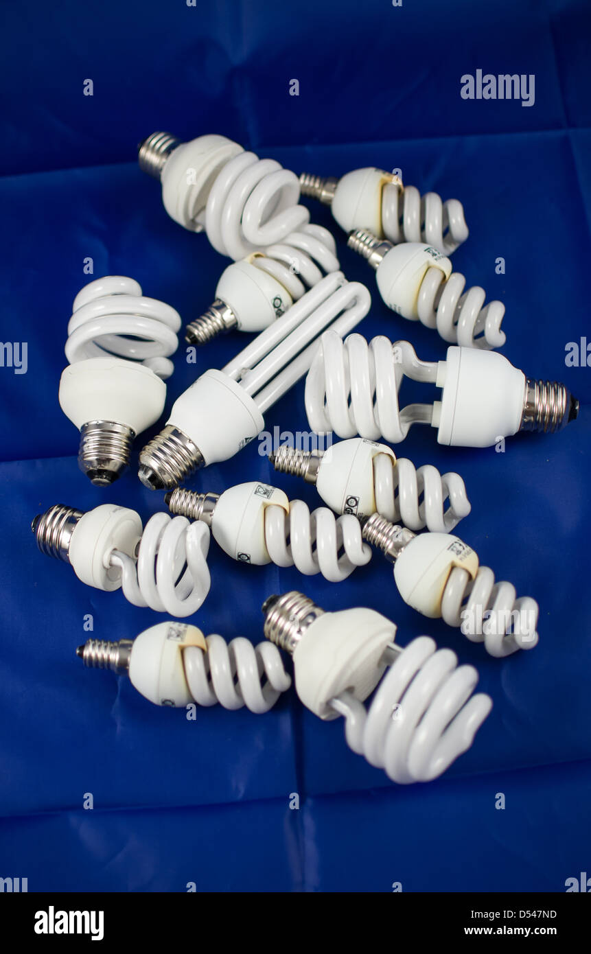 Energy saving lightbulb and change hi-res stock photography and images ...
