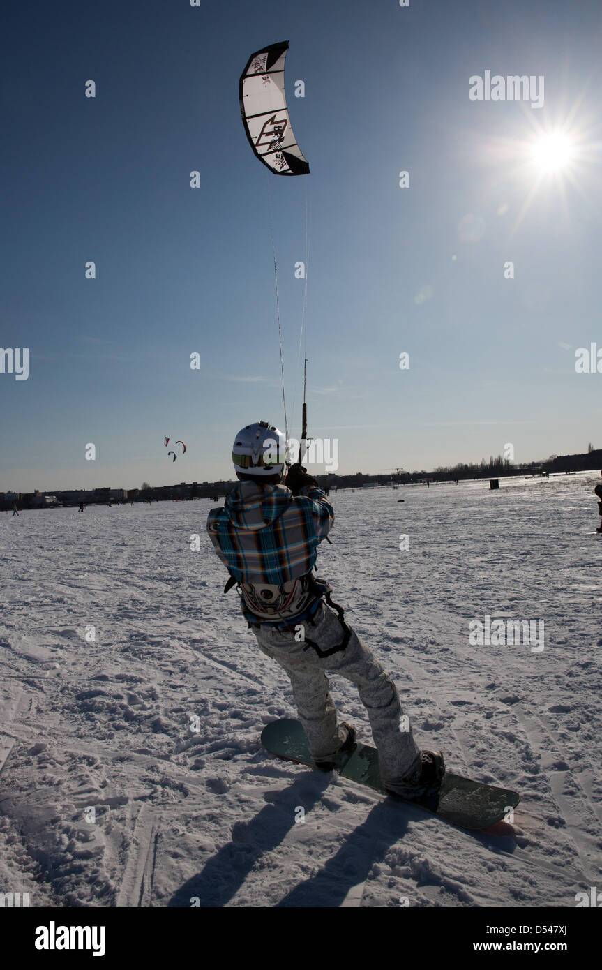 A snowkiter takes a ride at Tempelhofer Feld in Berlin, Germany, 24 ...