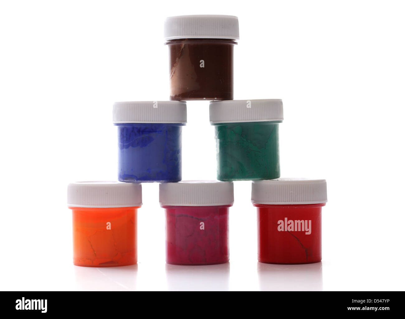 pyramid of cans of paint, studio isolated Stock Photo - Alamy