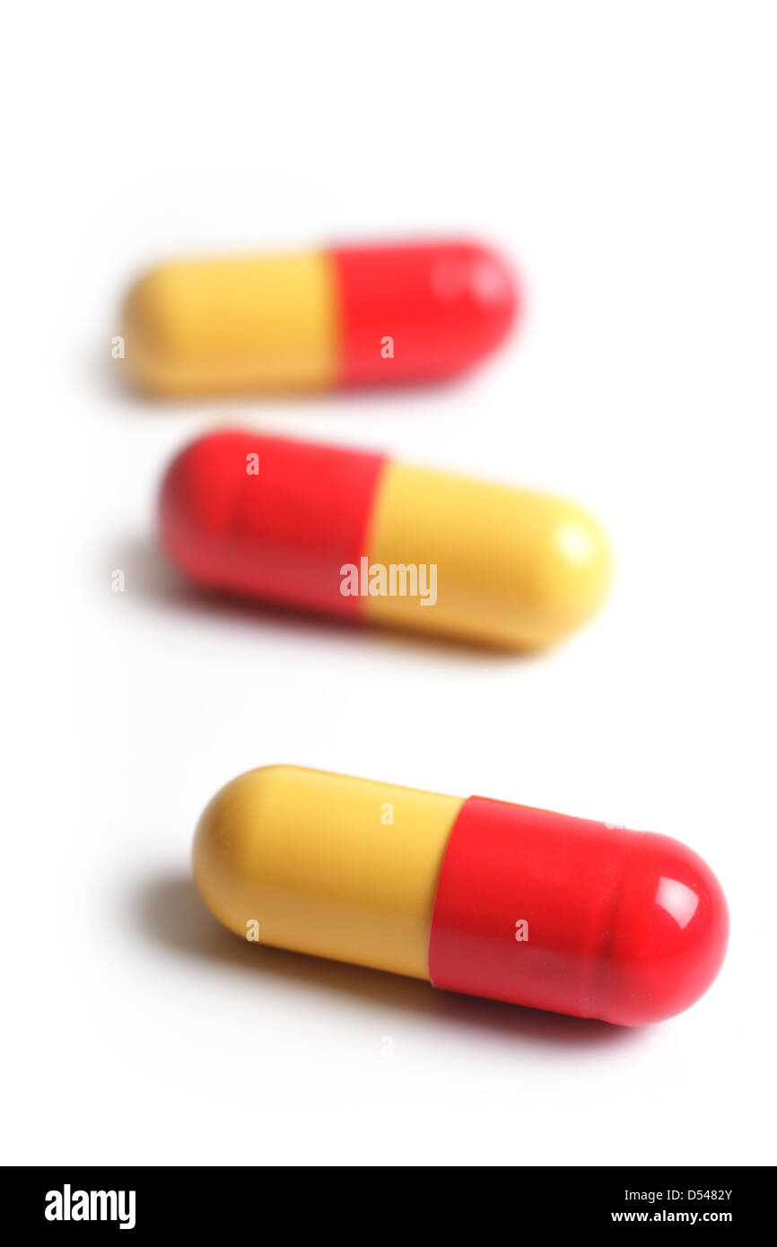 Capsules on a white background, studio isolated Stock Photo - Alamy