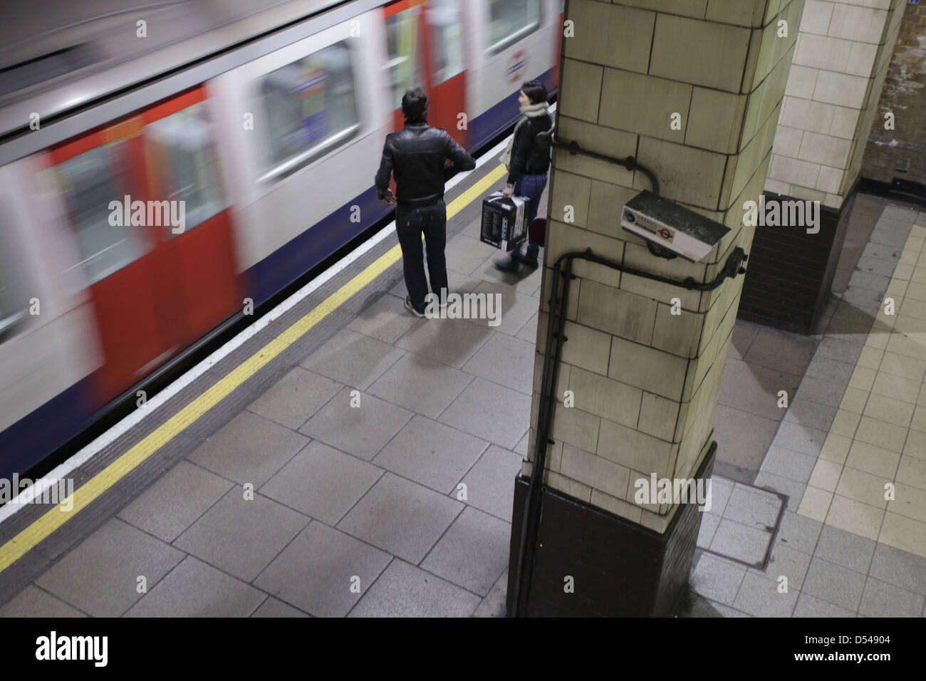 two (2) passengers await train on the London Underground Stock Photo ...
