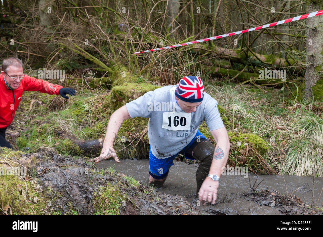Kilmarnock, UK. 24 March 2013. Organised Mud Run at Craufurdland Castle ...