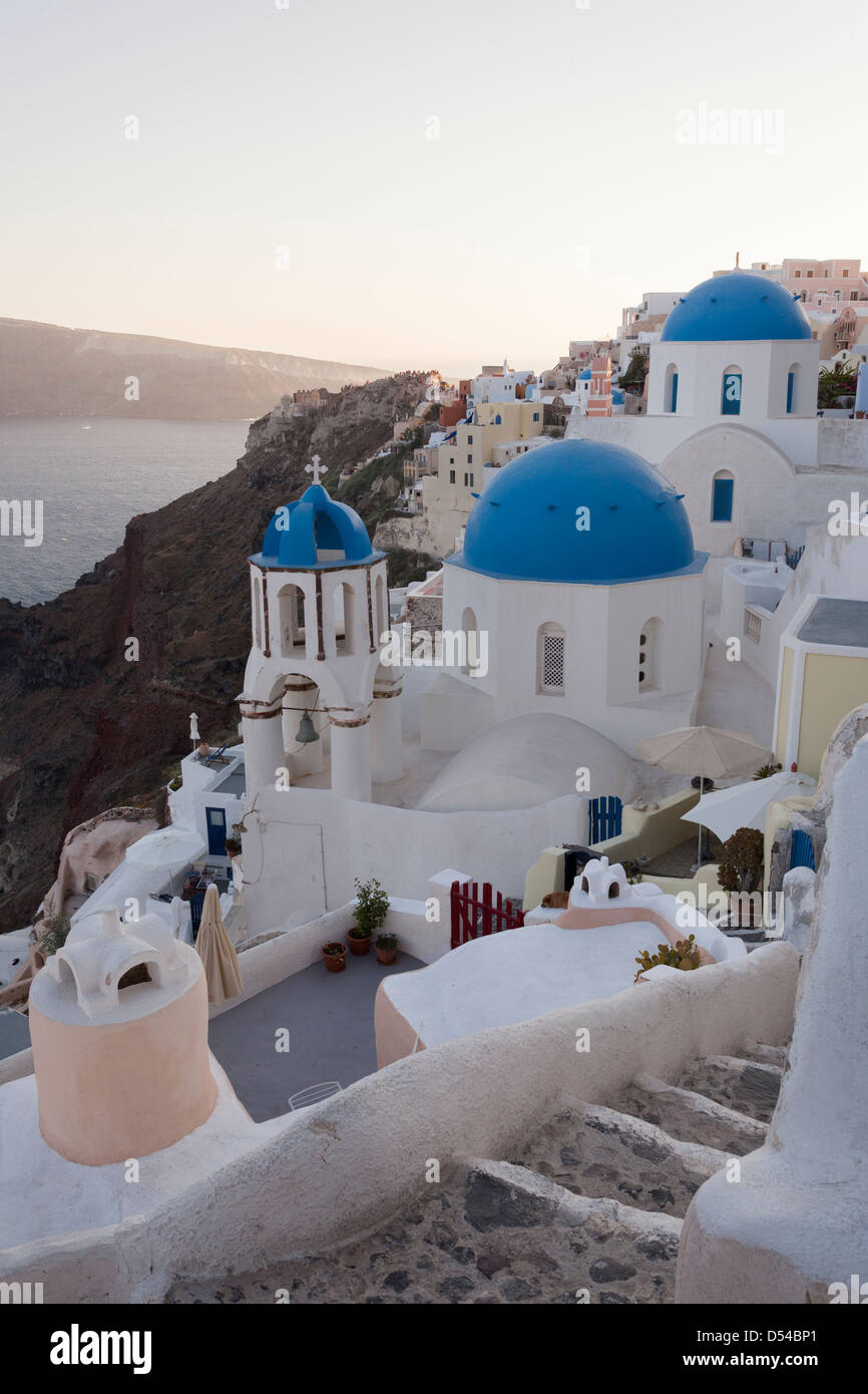 Greek church buildings on cliff, Oia village, Santorini, Greece Stock ...