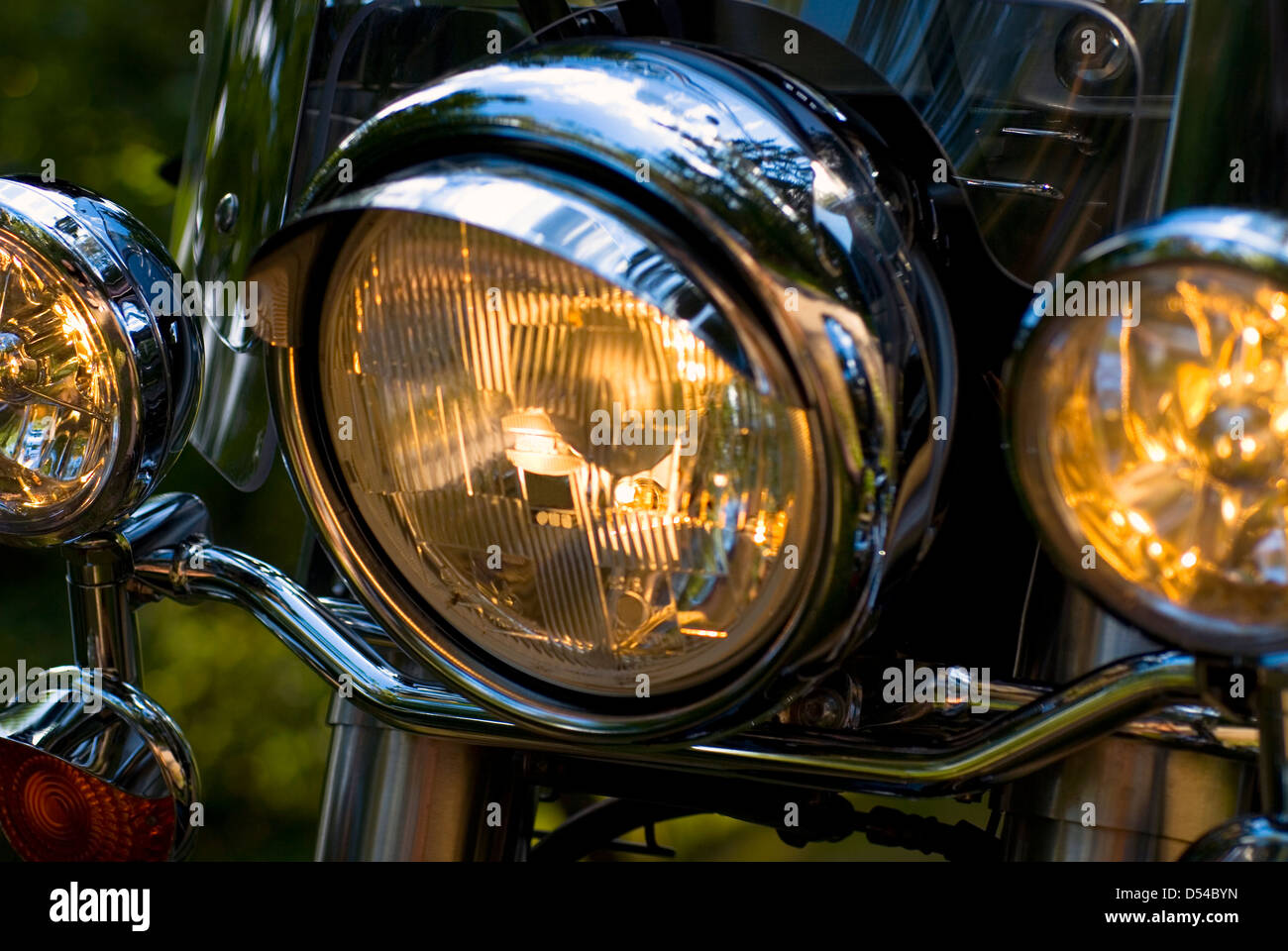 Close-up of motorcycle lights, shallow dof, focus on left-turn signal ...