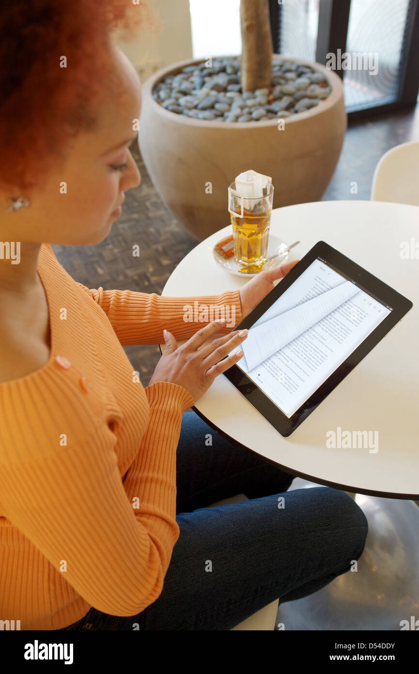 Person using ipad in vertical hi-res stock photography and images - Alamy