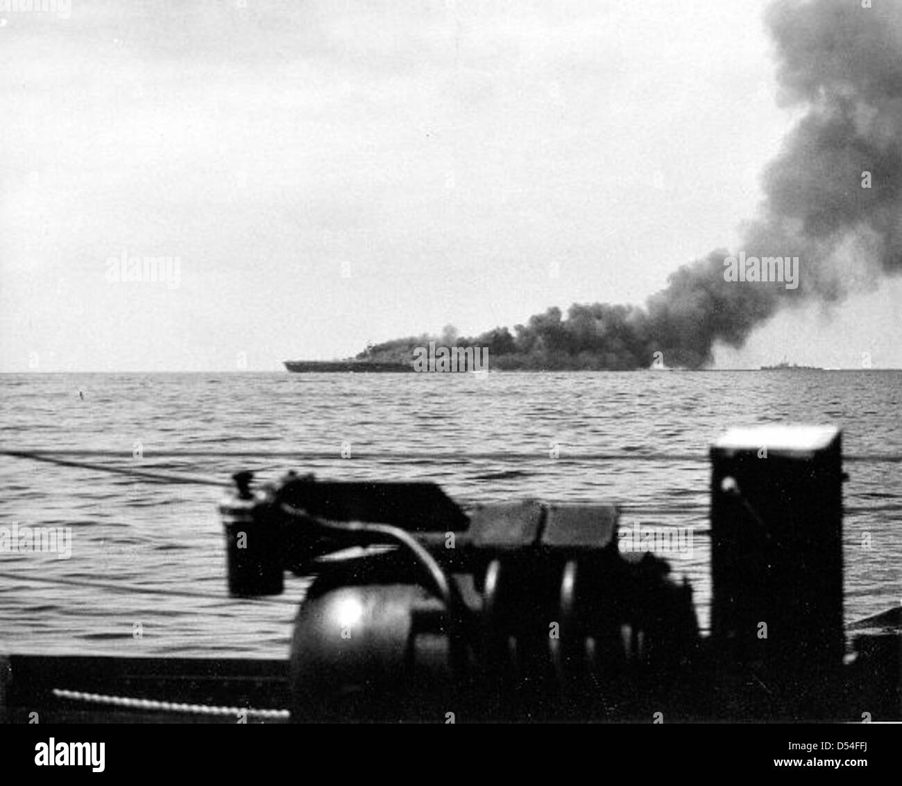 Damaged aircraft carrier uss Black and White Stock Photos & Images - Alamy