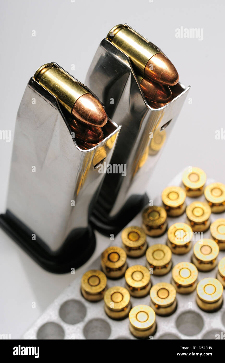 Loaded 9 mm/16 round semi-automatic magazines or clips with box of ...