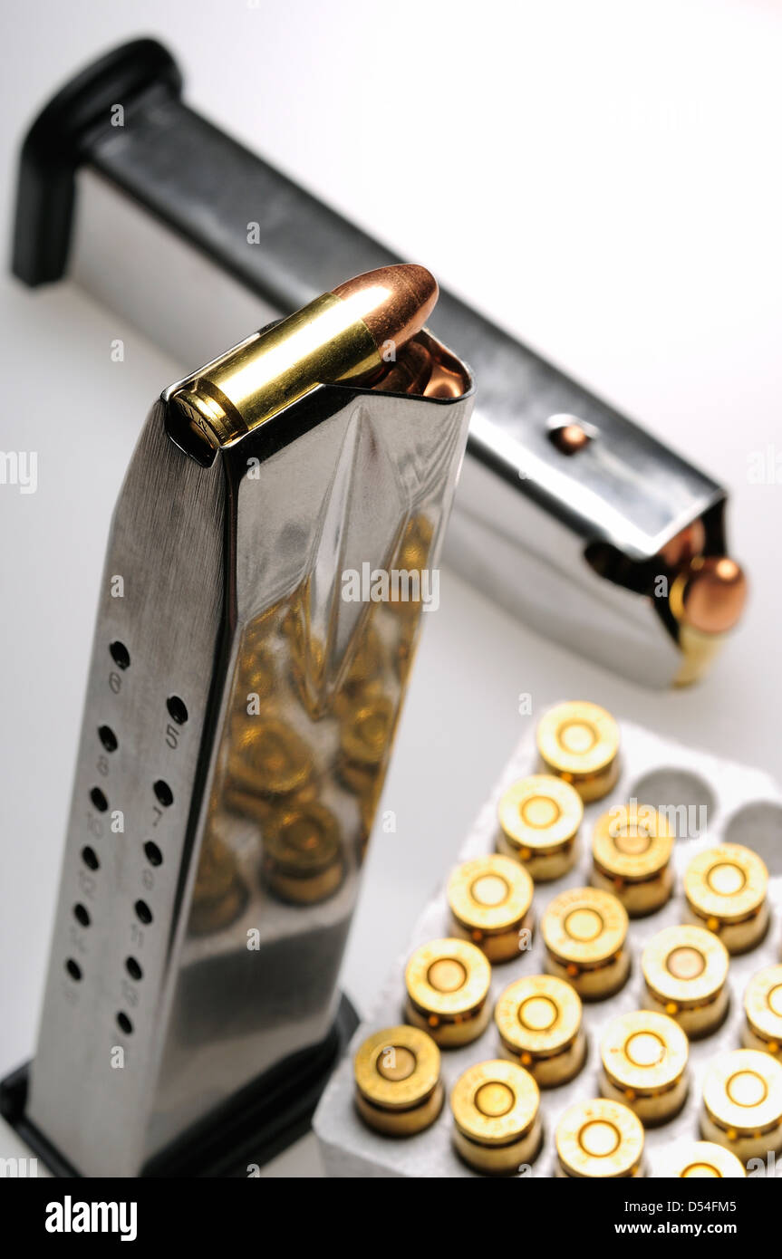 Loaded 9 mm/16 round semi-automatic magazine or clips with box of ...