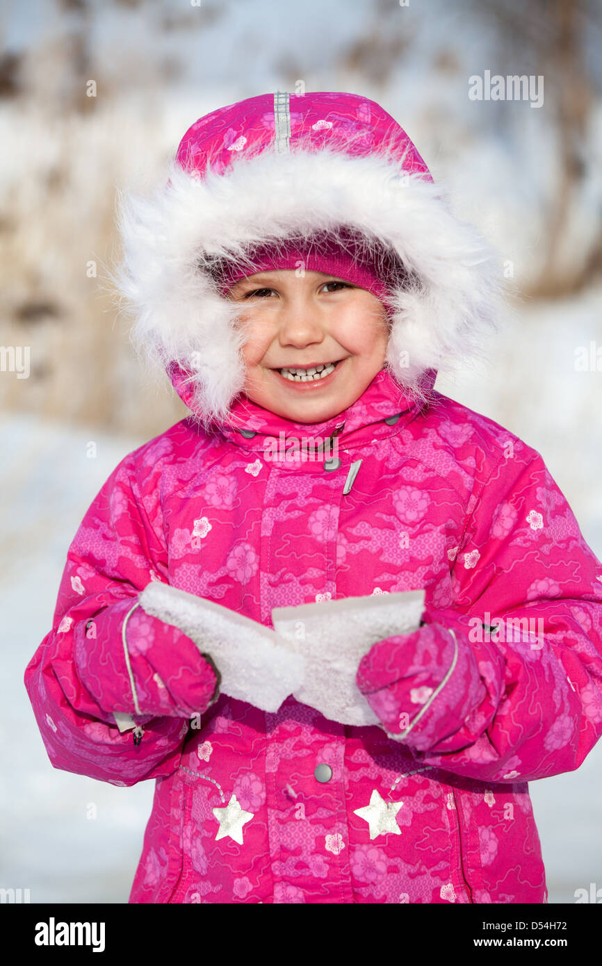 Child in winter clothes hi-res stock photography and images - Alamy