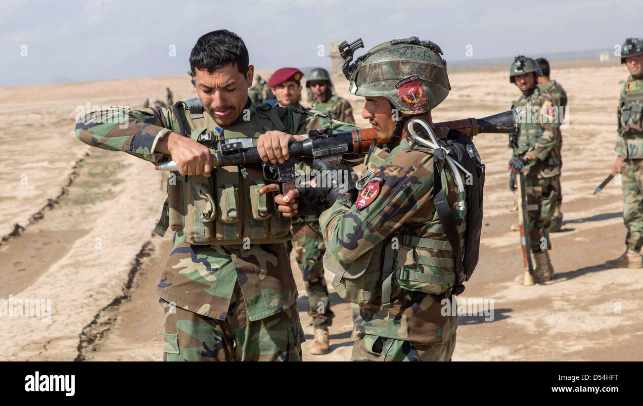 Afghan commandos from Special Operations Kandak prepare to fire a ...