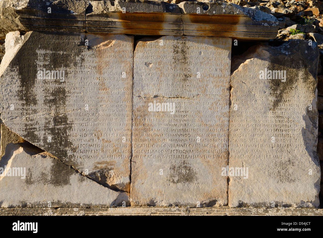 Latin inscription on stone blocks on Curetes street of ancient Roman ...