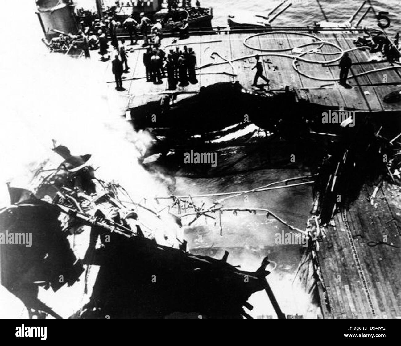 Damaged aircraft carrier uss Black and White Stock Photos & Images - Alamy