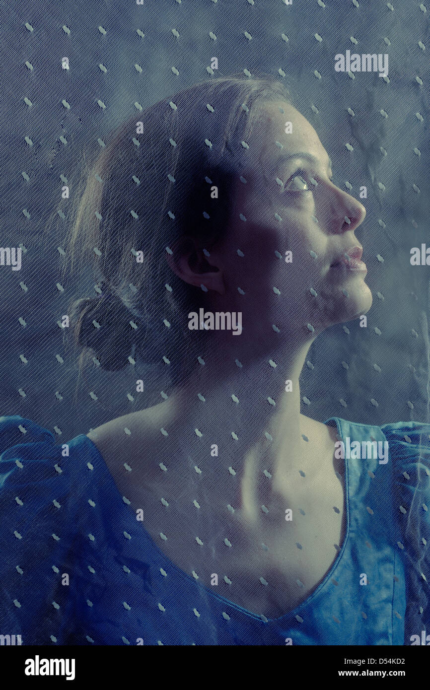 Woman behind curtain hi-res stock photography and images - Alamy
