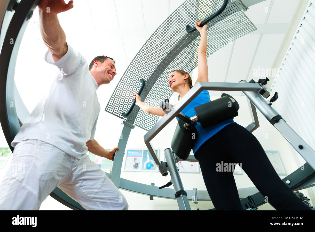 Space Curl - Patient at the physiotherapy making physical exercises ...
