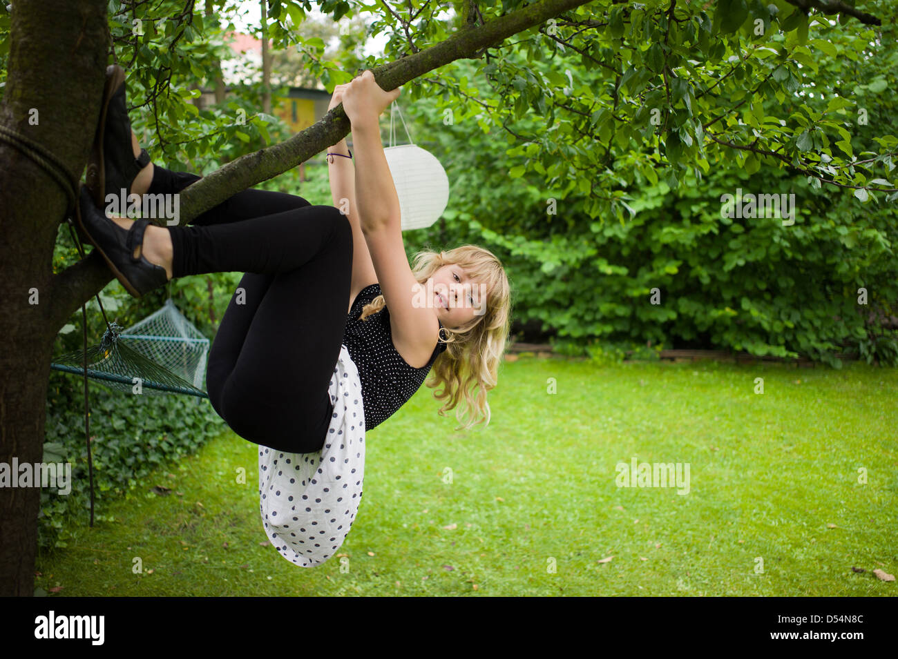 Girl hangs hi-res stock photography and images - Alamy