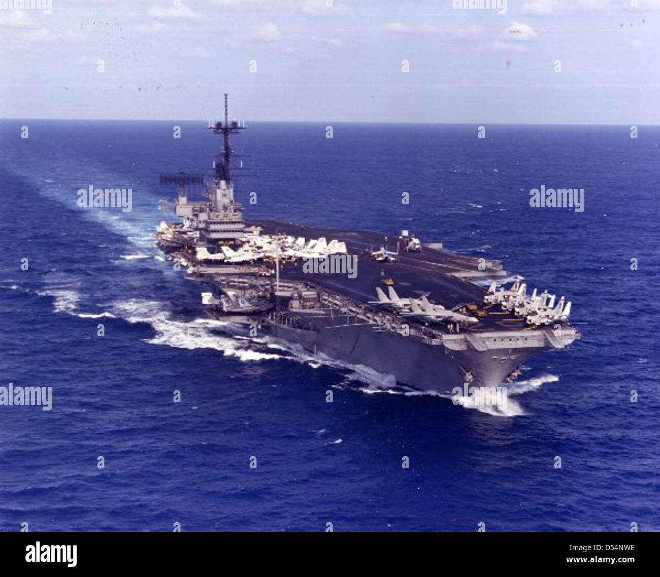 The USS Kitty Hawk (CVA-62) is underway, participating in naval ...