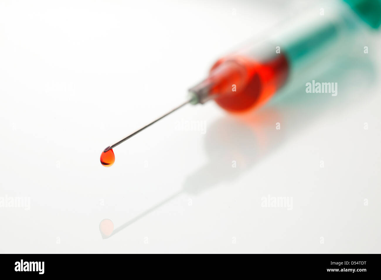 Freiburg, Germany, syringe with blood drop Stock Photo - Alamy