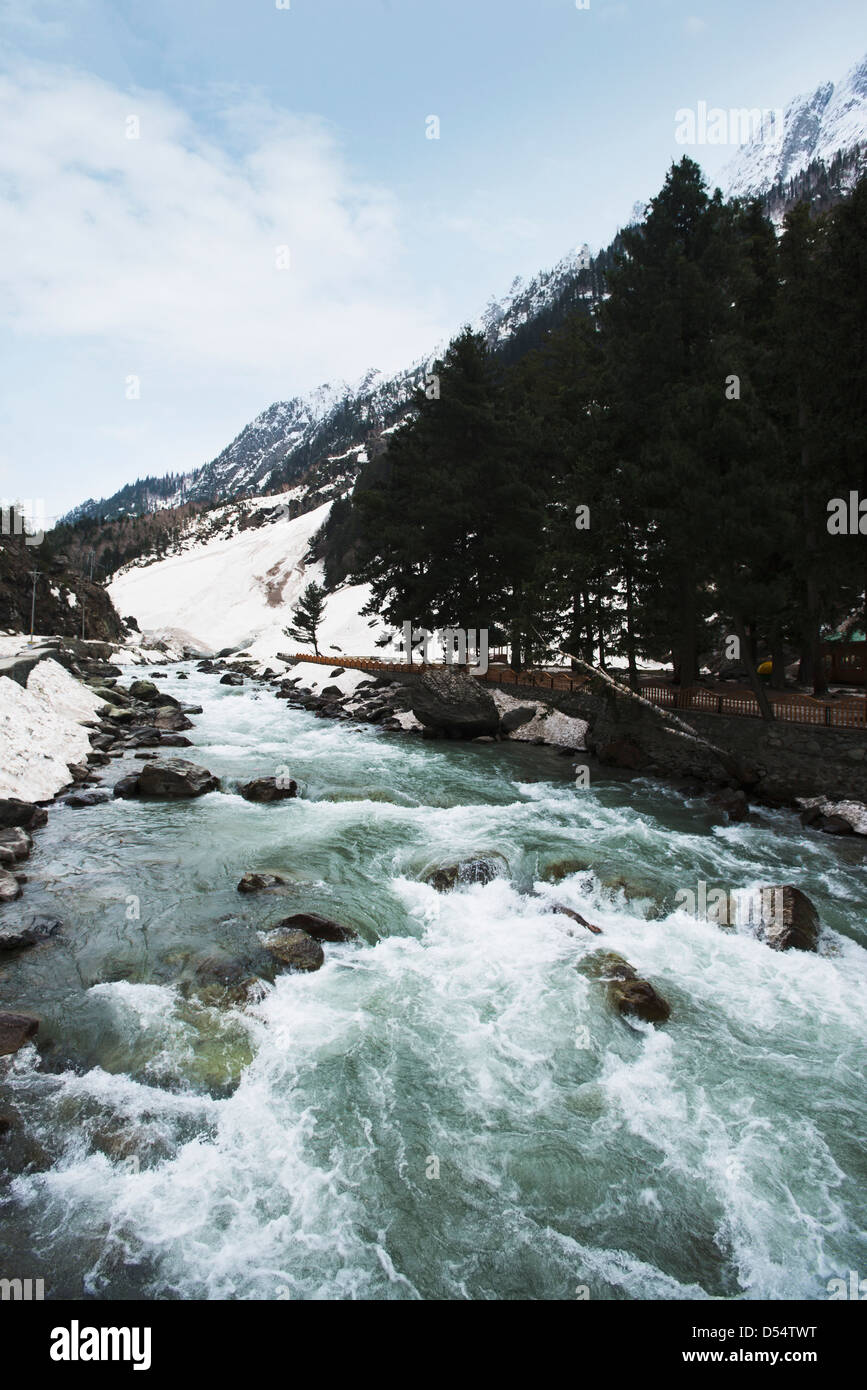 River flowing in the snowy valley, Sonmarg, Jammu And Kashmir, India ...