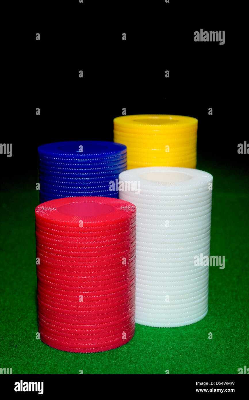 colored game playing chips Stock Photo - Alamy