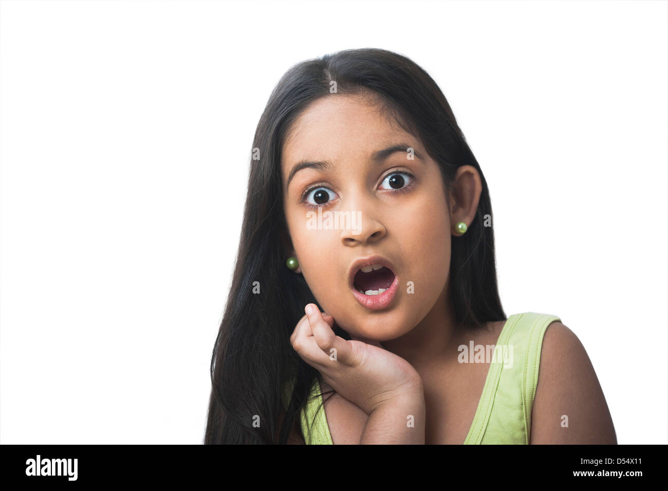 Portrait of a girl looking shocked Stock Photo - Alamy