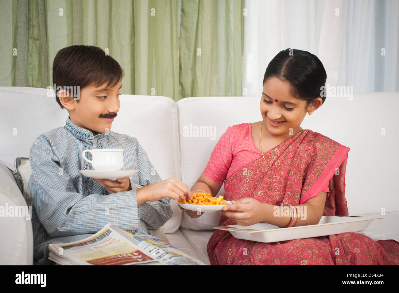 Children imitating like couple at home Stock Photo - Alamy
